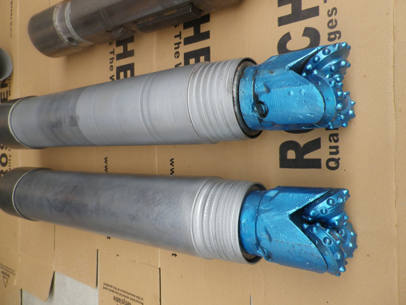 Integral Operation Casing Advancer With Tricone Rock Roller Bits